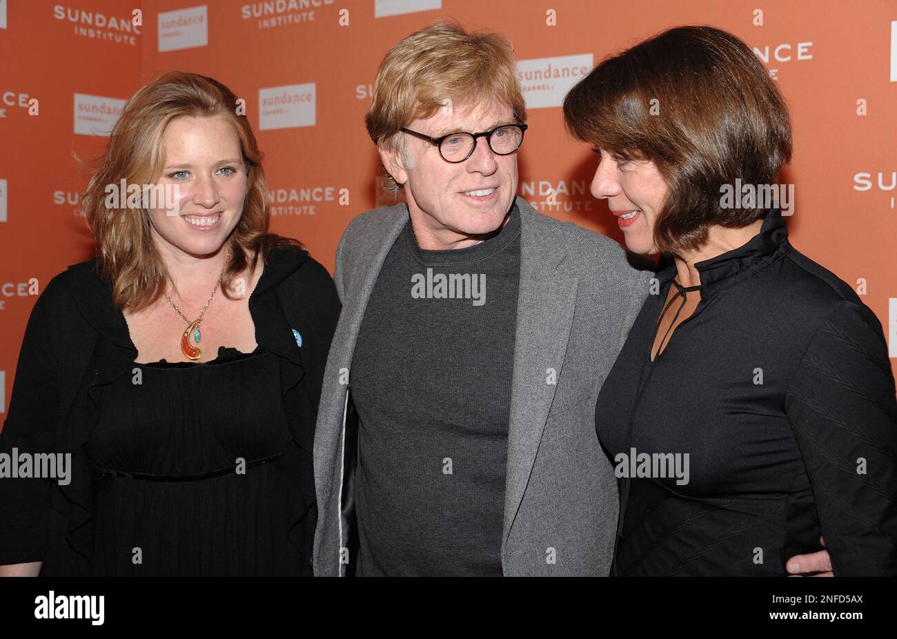 Actor Robert Redford, center, poses with daughter Amy Redford, left ...