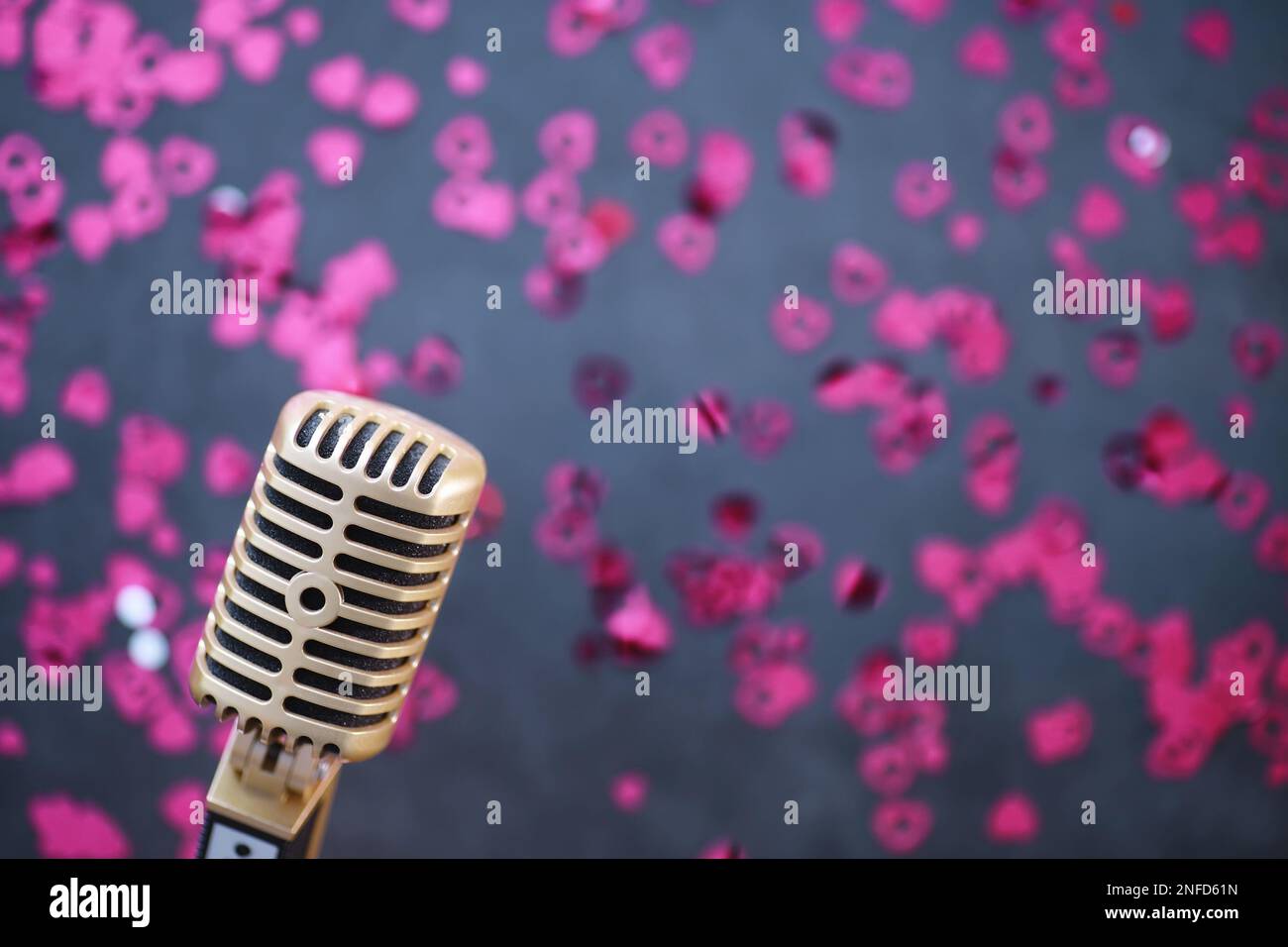 The concept of media presentations. Retro microphone on background ...