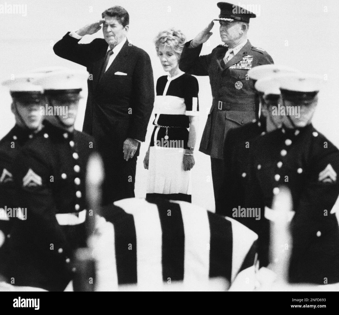 President Ronald Reagan and Marine Corps Commandant P. X. Kelley flank ...