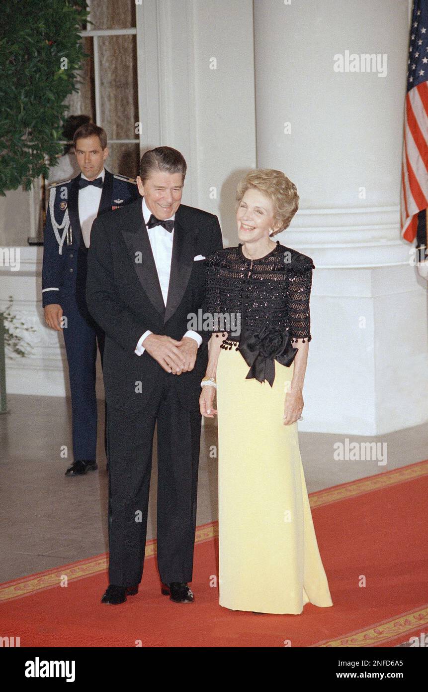 President Ronald Reagan and his wife, first lady Nancy Reagan, are ...