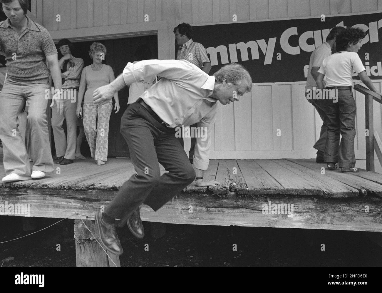 Democratic presidential front runner Jimmy Carter jumps from the train ...