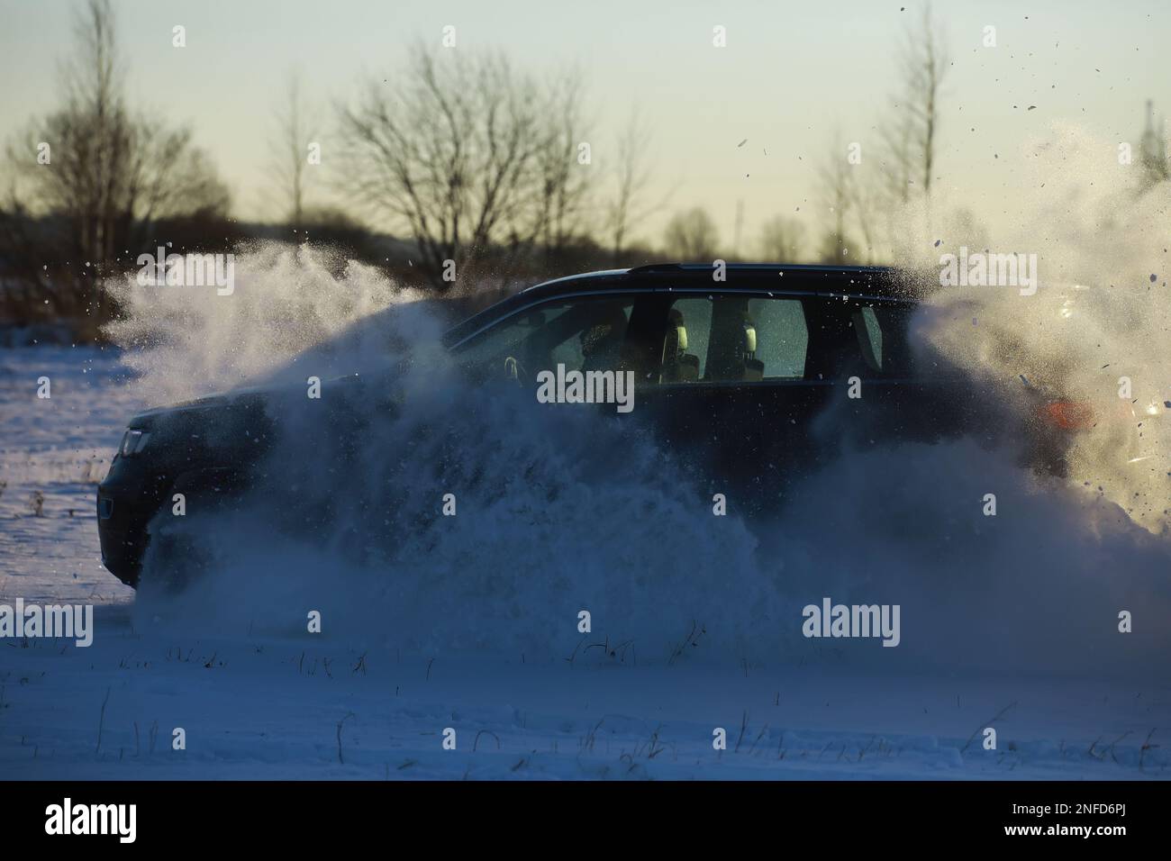 Car in the field winter. Off-road winter snow drifts. Extreme sport ...