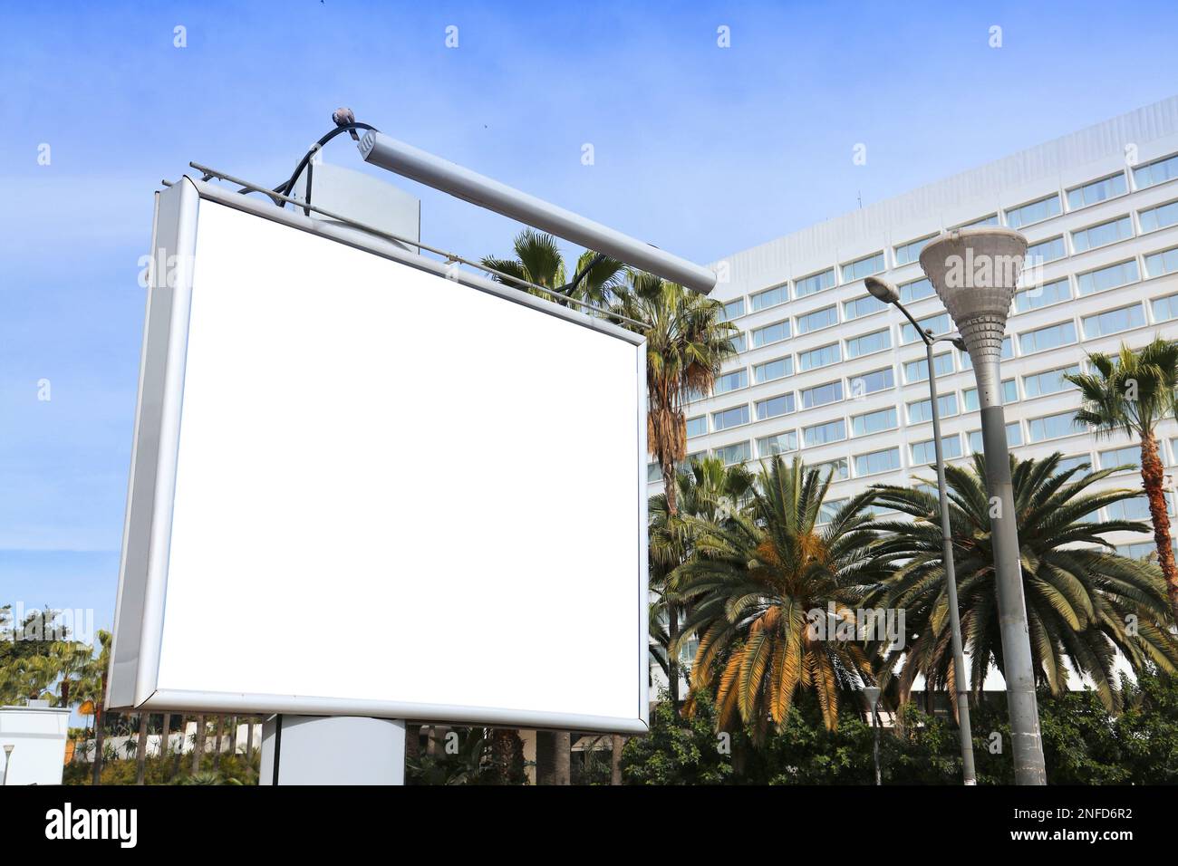 Blank billboard ad. Empty white advertisement with copy space in a big ...