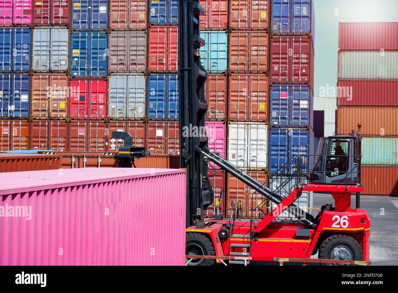 forklift truck Container boxes in a logistics yard with a stack of ...