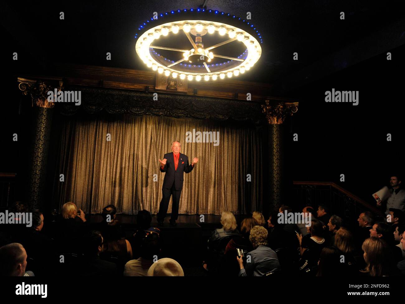 Magic Castle co-founder Milt Larsen introduces a magic show during a ...