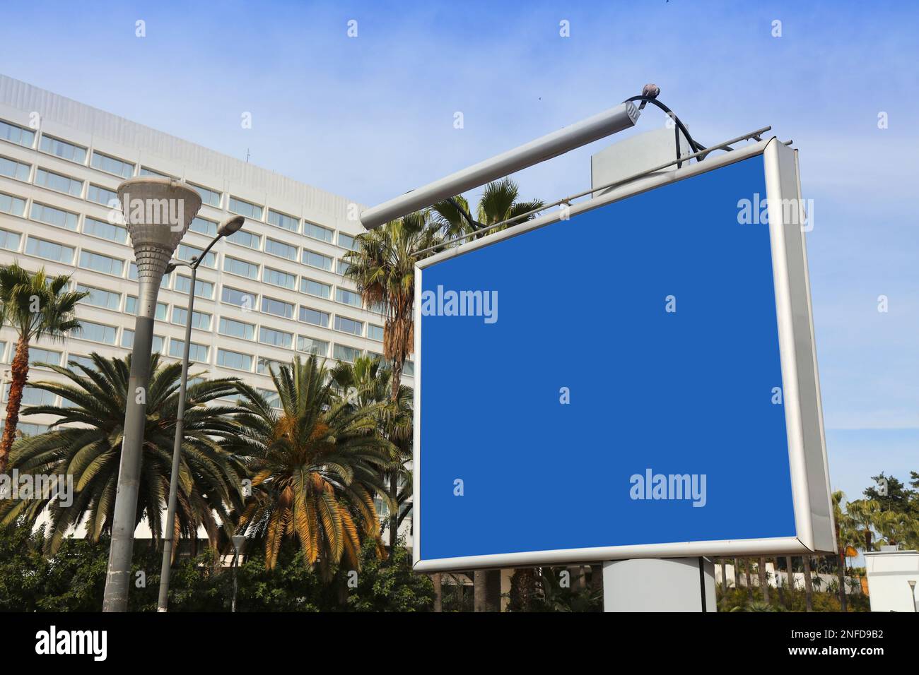 Blank billboard poster advertisement. Empty blue ad with copy space in ...