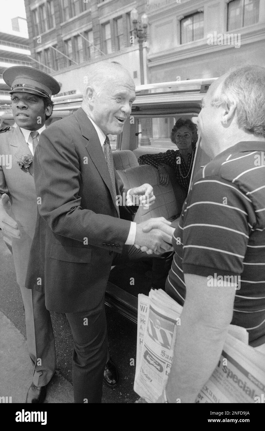 Ohio Senator John Glenn, left, shakes hands with Walter Mondale ...