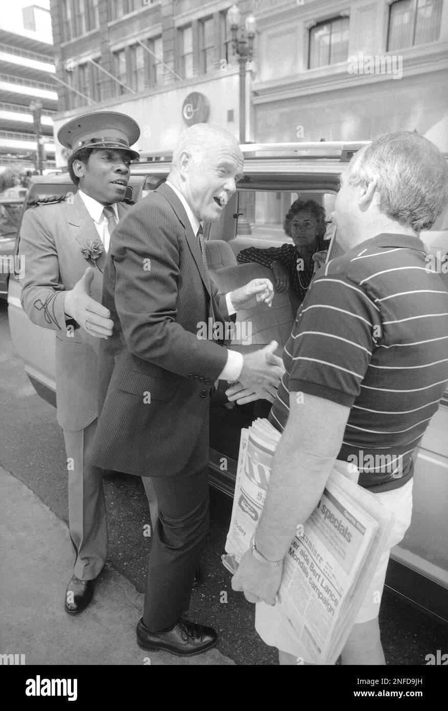 Ohio Senator John Glenn, left, shakes hands with Walter Mondale ...