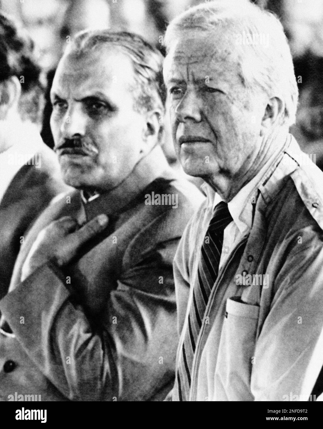 Pakistan President Gen. Mohammed Zia Ul-Haq (left) and his guest former ...