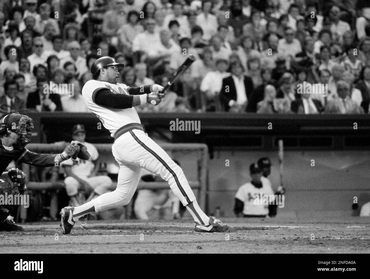 California Angels' Reggie Jackson puts everything behind his swing as ...