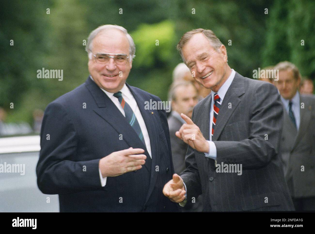 U.S. President George Bush, right, and German Chancellor Helmut Kohl ...