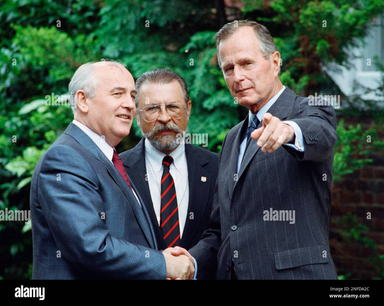U.S. President George Bush and Soviet President Mikhail Gorbachev shake ...