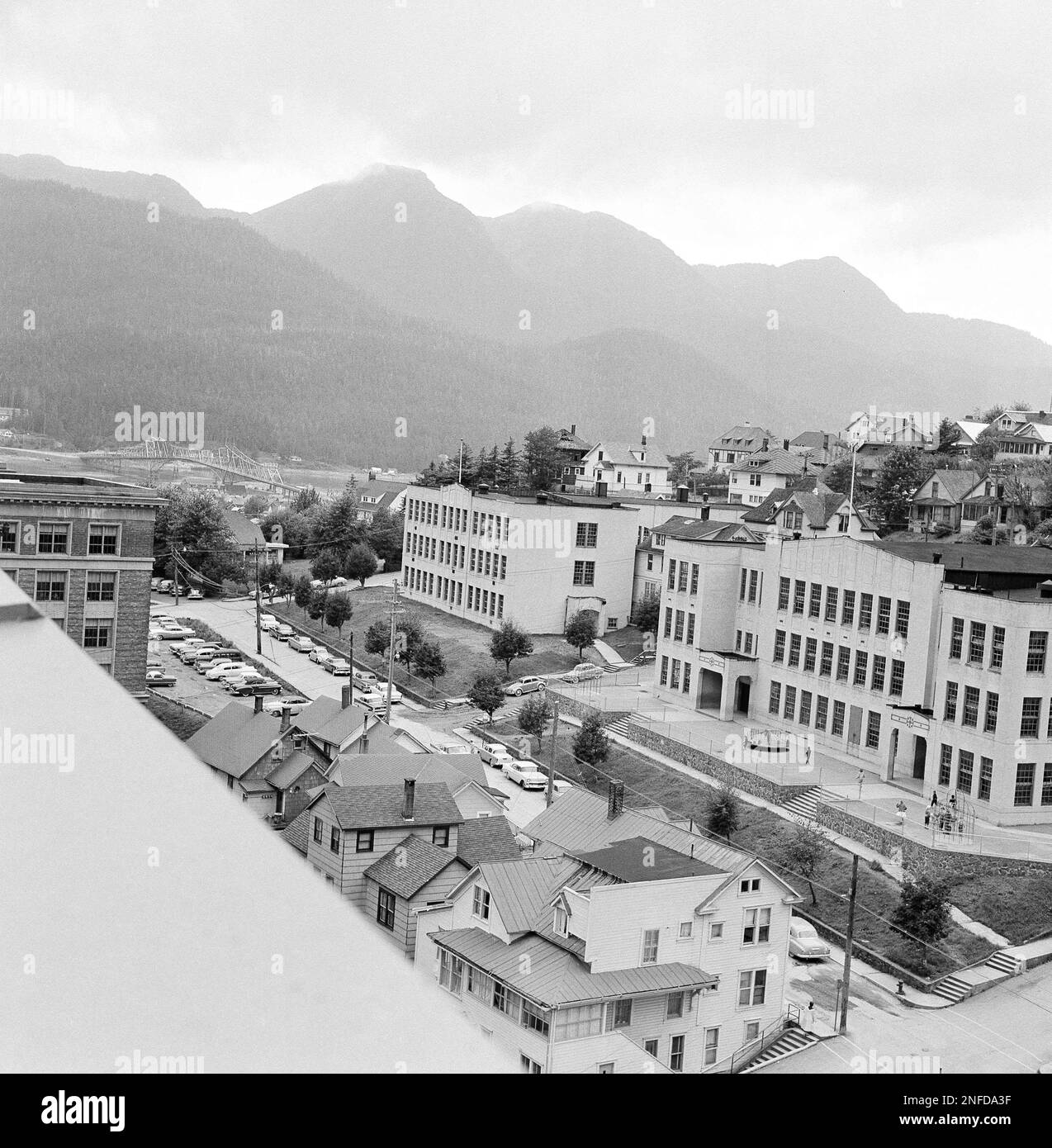 The public school buildings of Juneau, Alaska are shown on the right ...
