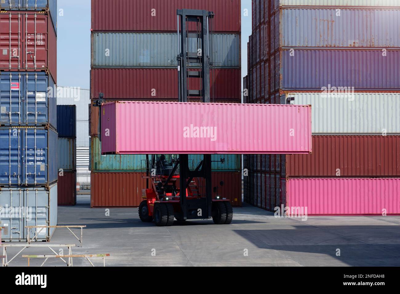 forklift truck Container boxes in a logistics yard with a stack of ...