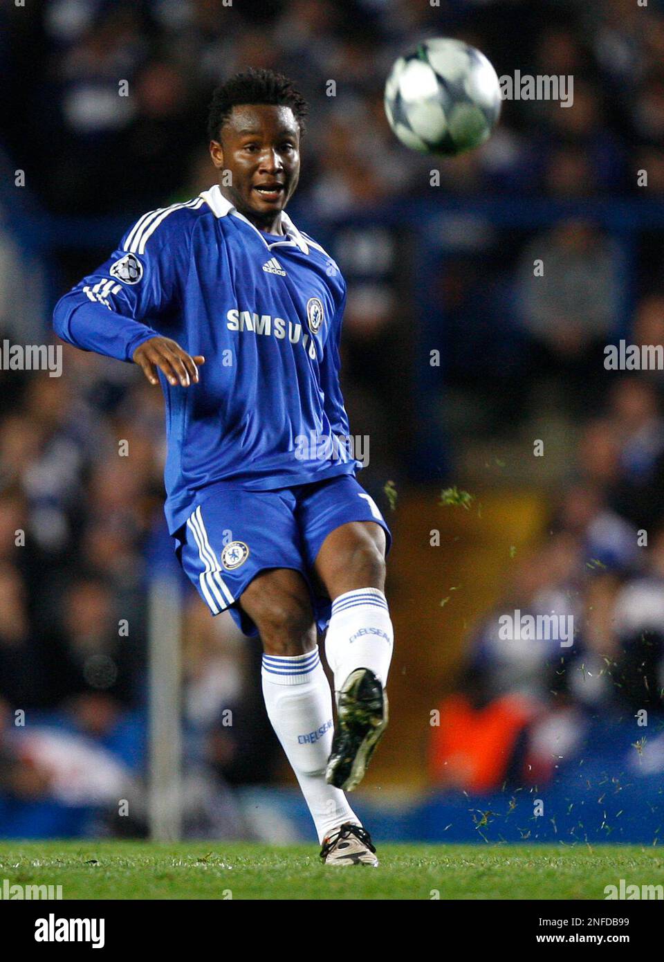 Chelsea's John Mikel Obi goes for the ball during their Champions ...