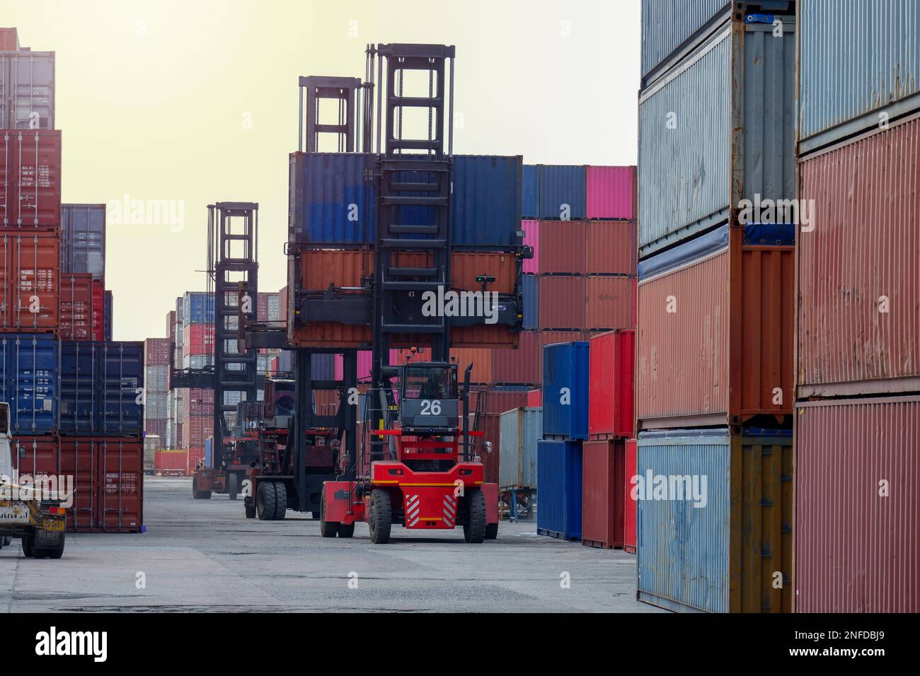 forklift truck Container boxes in a logistics yard with a stack of ...