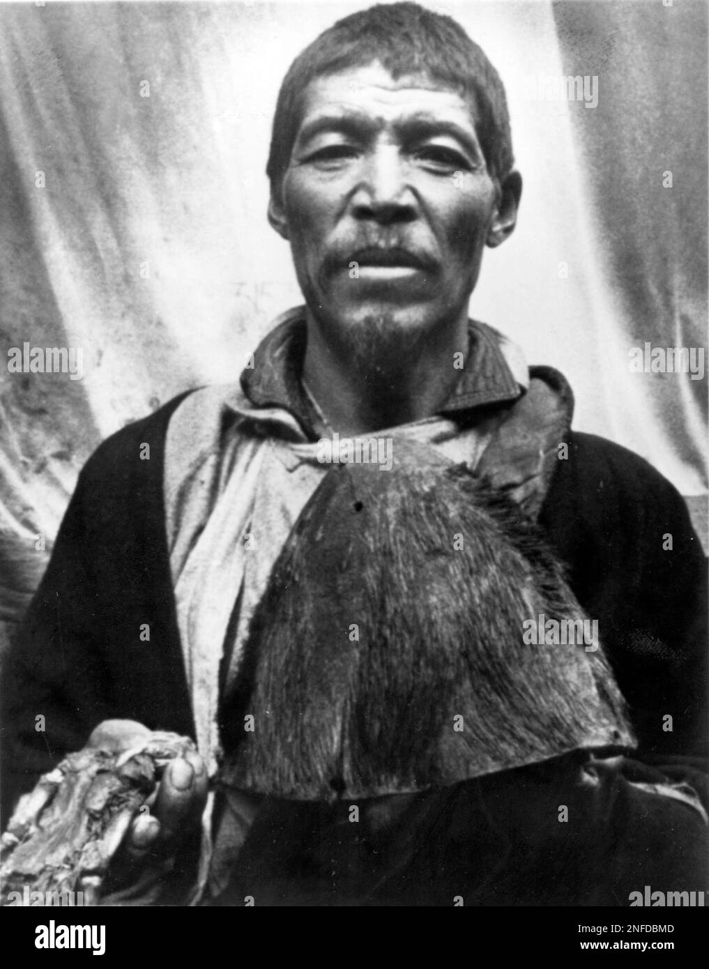 Lamaist monk displays a reputed Yeti (Abominable Snowman) scalp and ...