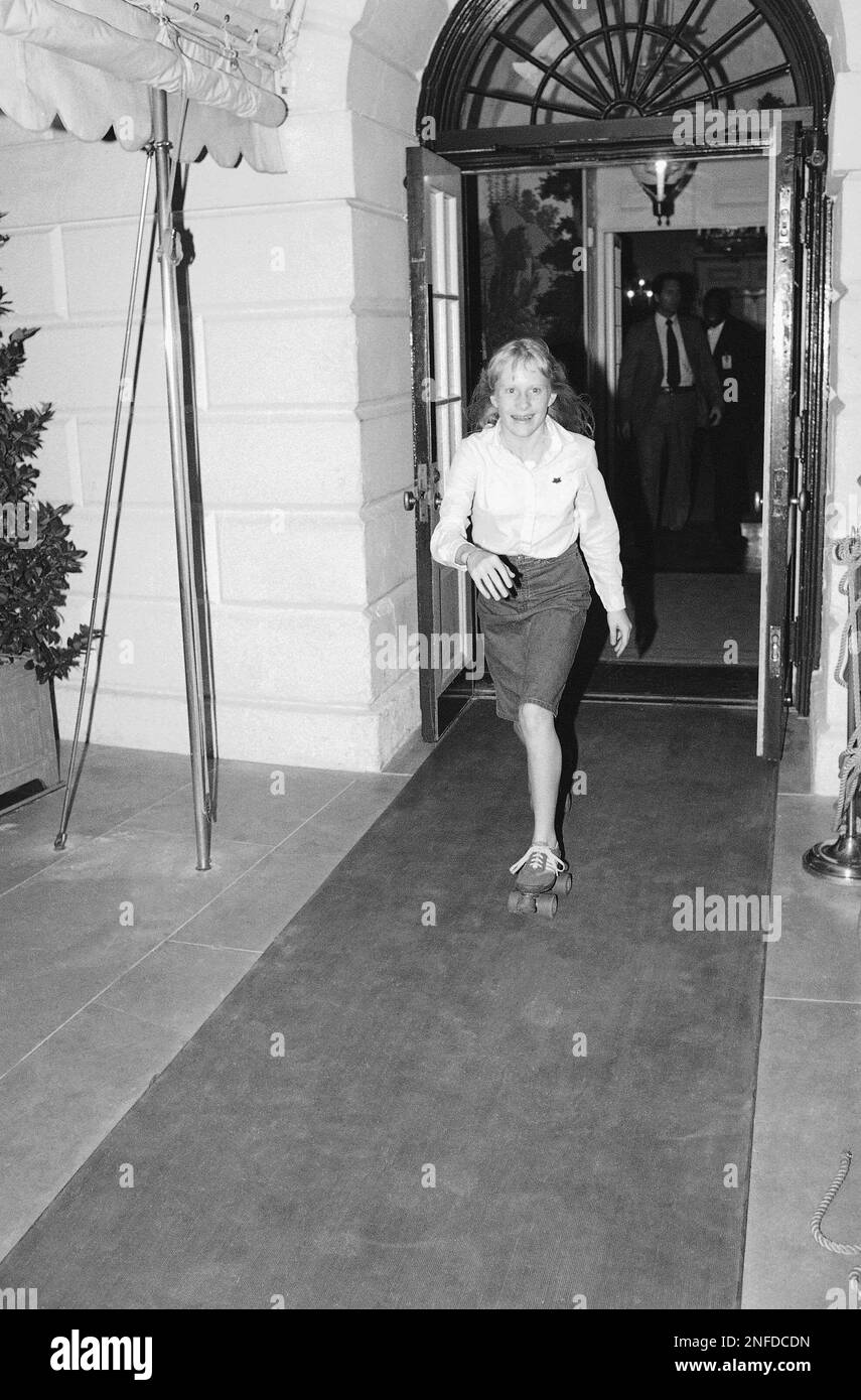 President Jimmy Carter's daughter Amy roller skates toward the ...