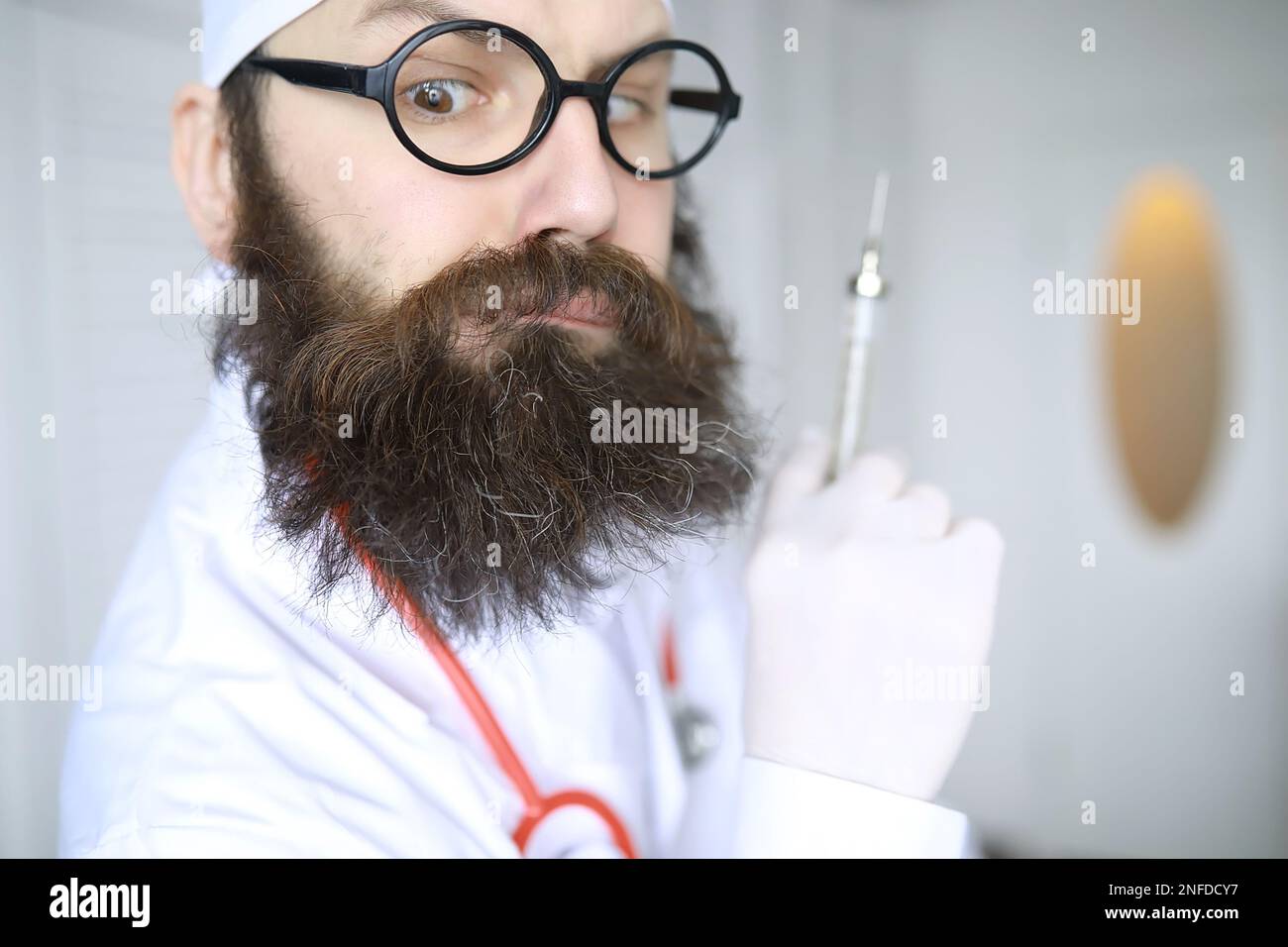 Doctor crazy. Mad beard scientist conducts experiments in a scientific ...