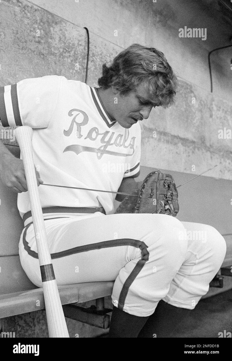 Pete LaCock puts new laces in his glove on Tuesday, Oct. 3, 1978 in ...