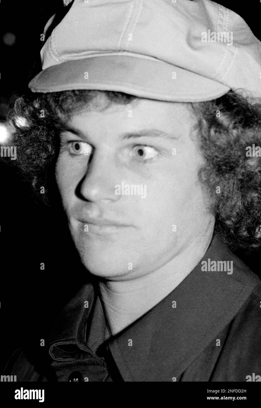Mark Cordell, 19, of San Francisco arrives at a hotel near New York's ...