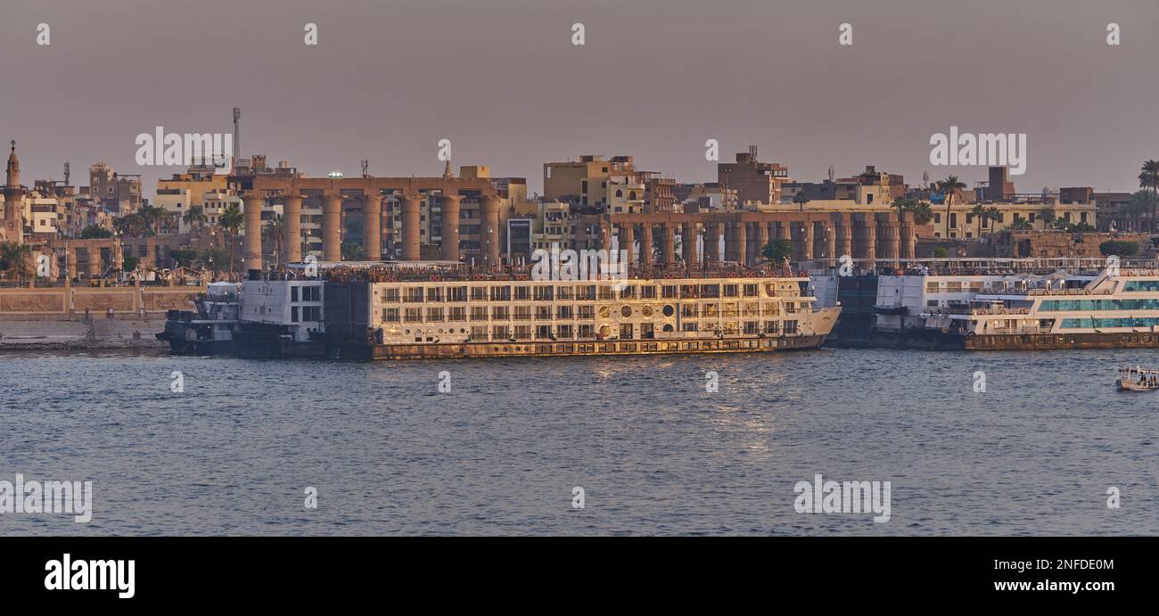 Luxor ,Egypt sunset shot from west bank showing Nile river with ...