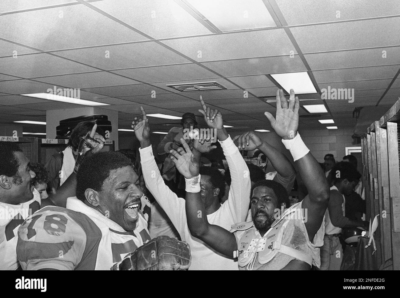 Los Angeles Rams celebrate in their dressing room after winning the NFC ...
