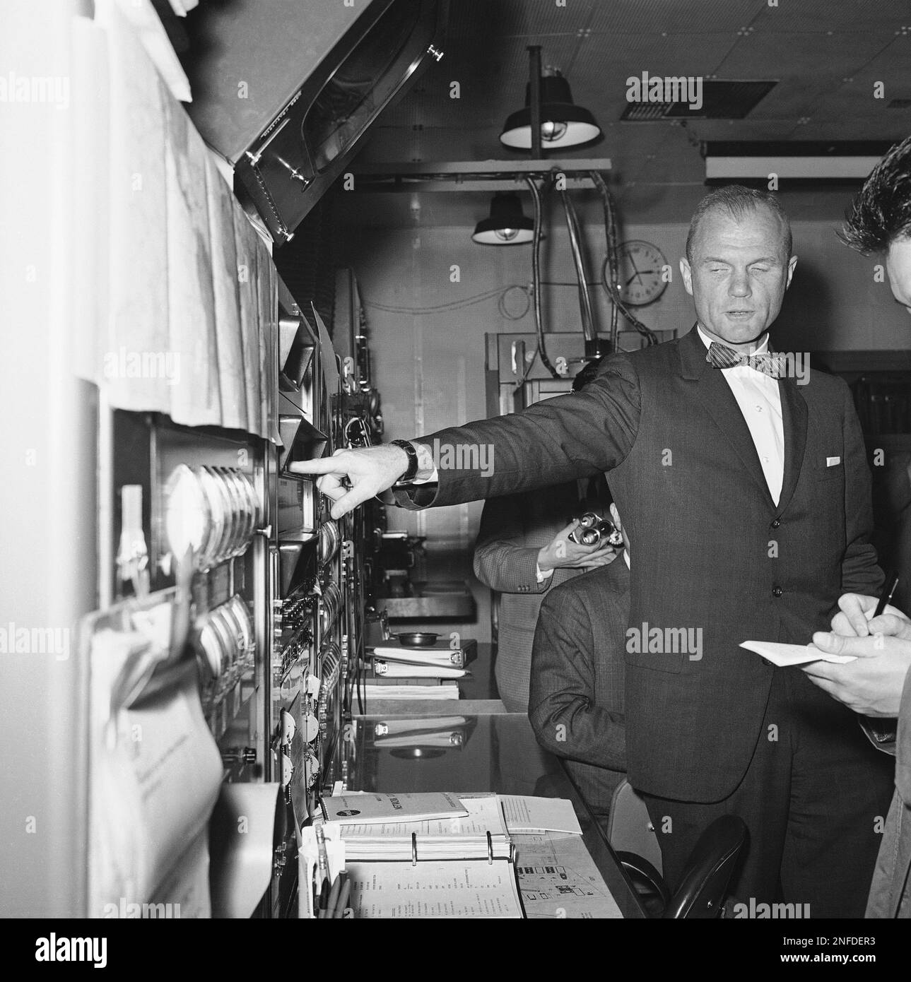 U.S astronaut John Glenn in the telemetry control room aboard the NASA ...