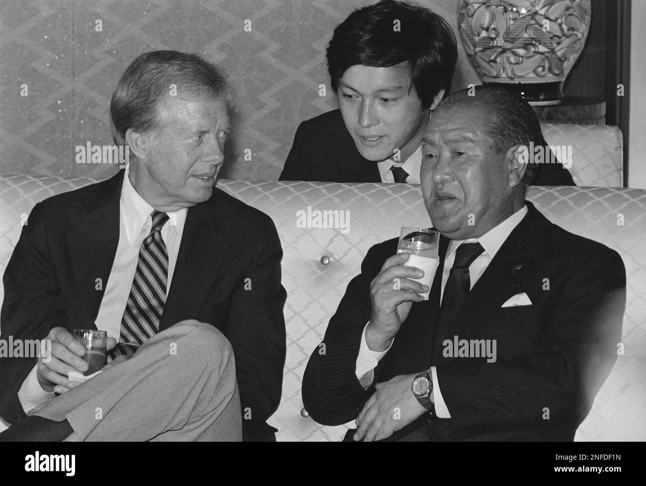 Former U.S President Jimmy Carter, left, chats with Japanese Prime ...