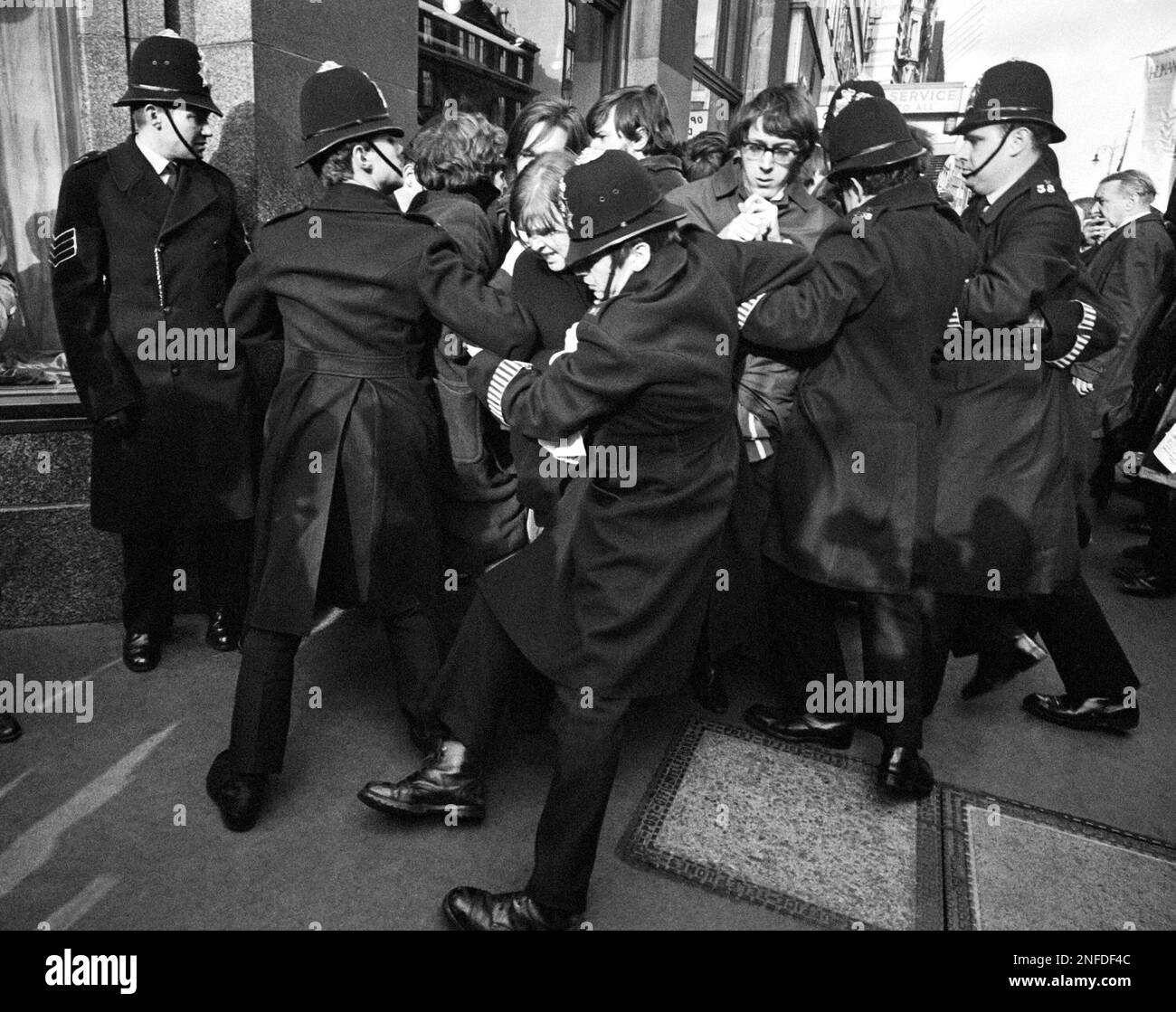 Uniformed London Police push back students demonstrating near Rhodesia ...