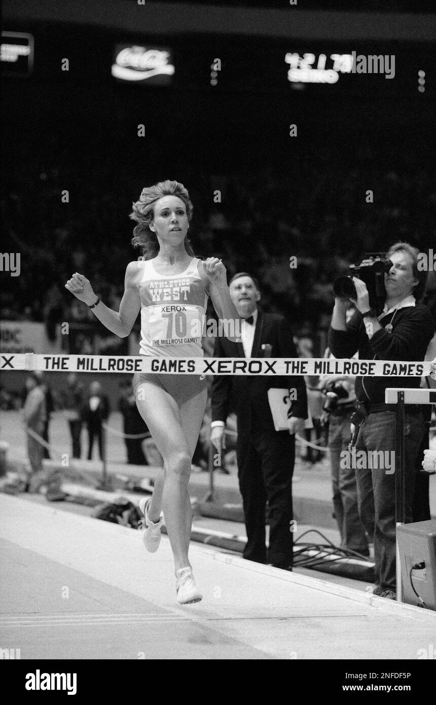 Mary Decker crosses the finish line as she wins the mile at the ...