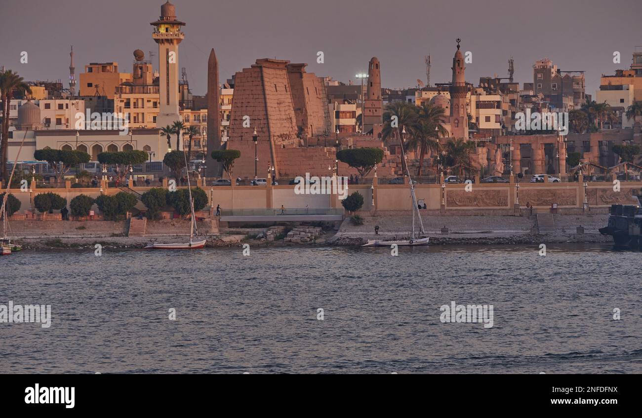 Luxor ,Egypt sunset shot from west bank showing Nile river with ...