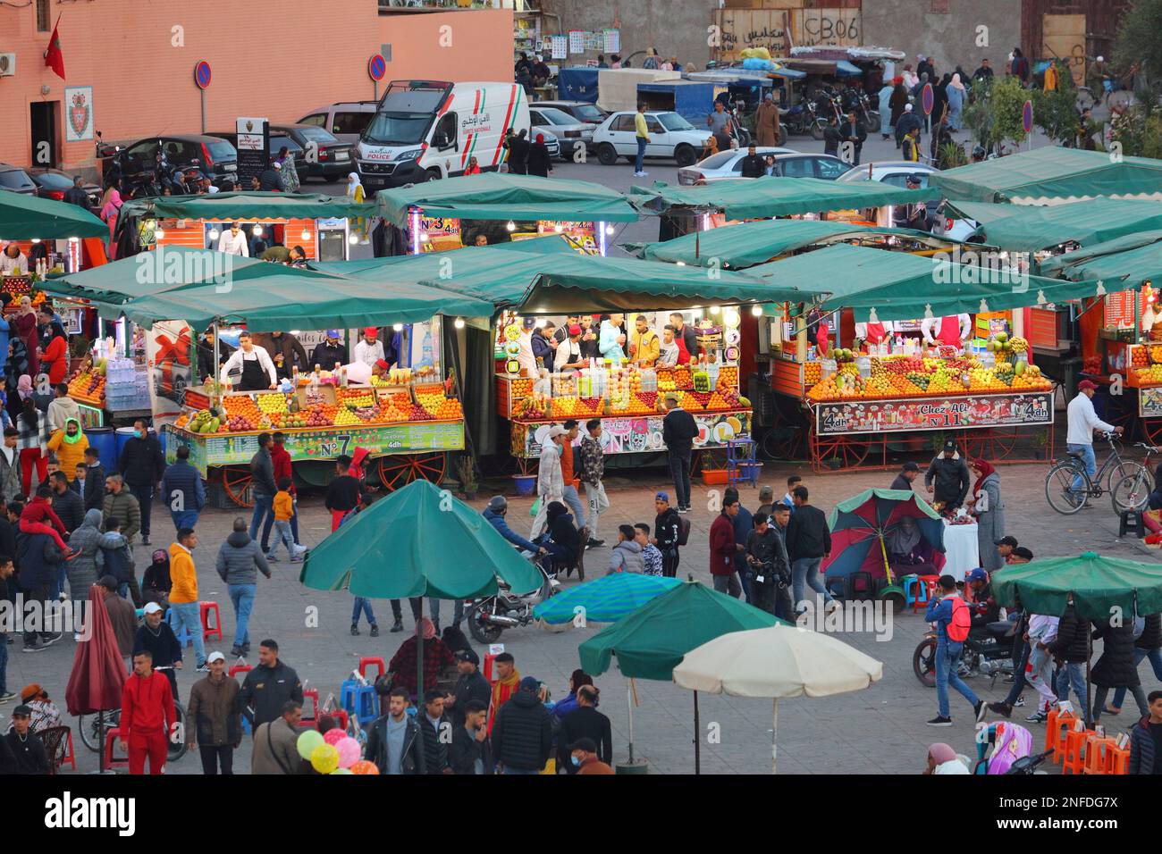MARRAKECH, MOROCCO - FEBRUARY 20, 2022: People visit Jamaa el-Fnaa ...