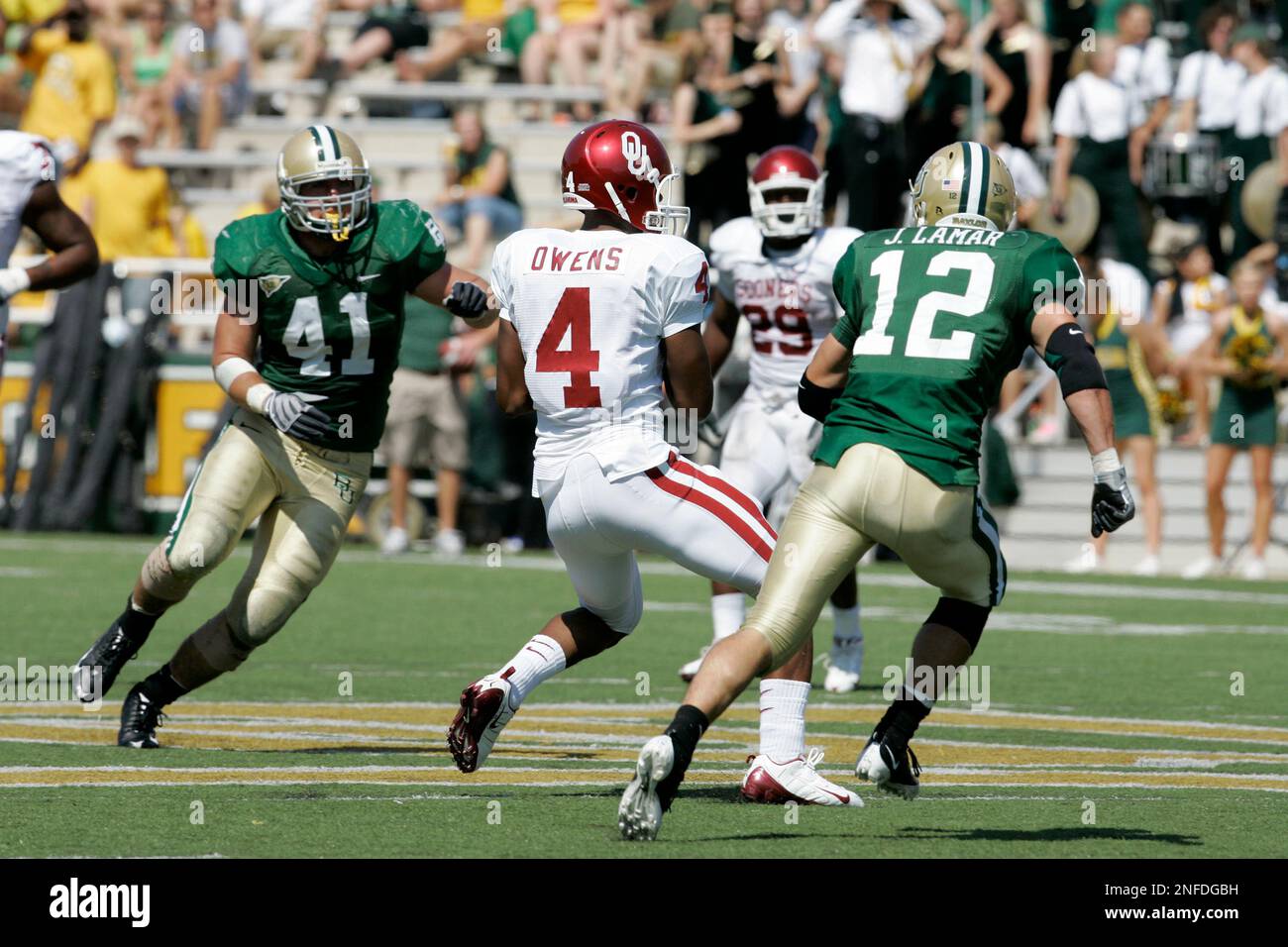 Baylor linebacker Joe Pawelek (41) and safety Jake La Mar (12) chase ...