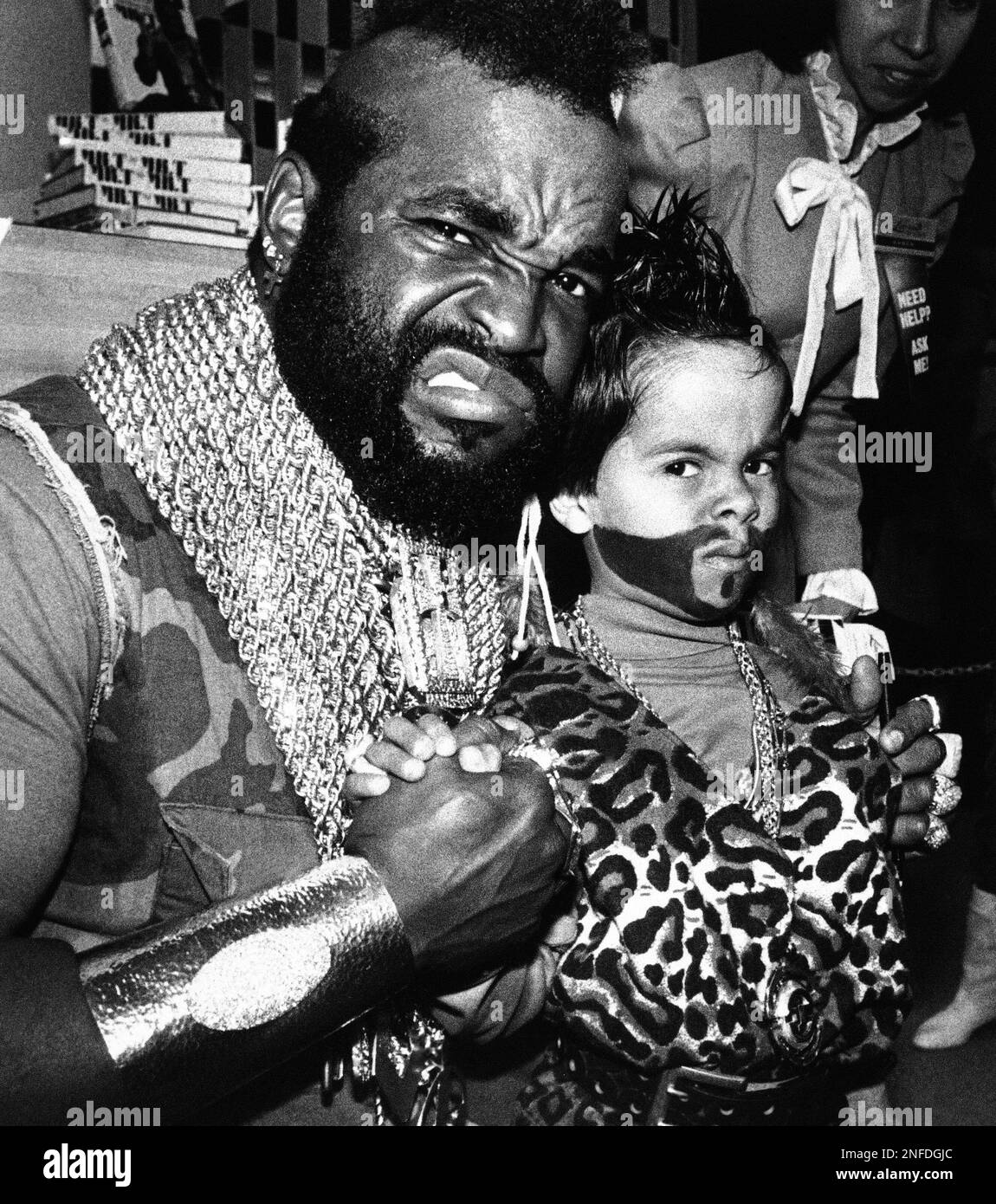 Television star Mr. T poses with look-alike Mark Gillette, 5, of ...