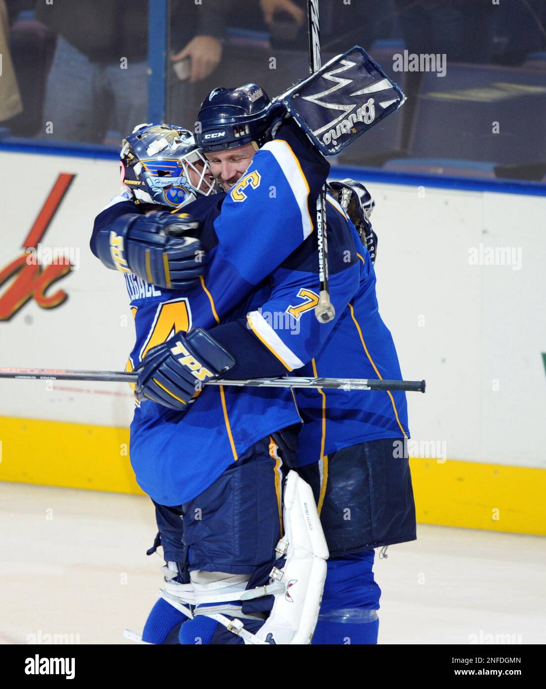 St. Louis Blues' Keith Tkachuk (7) and Manny Legace celebrate a victory ...