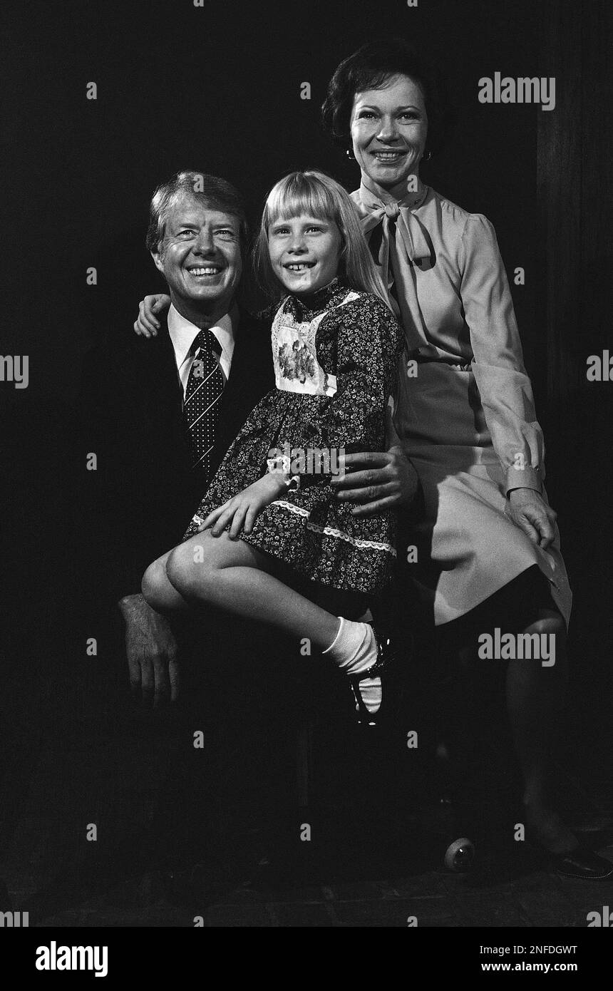 President-elect Jimmy Carter poses with his wife Rosalynn and daughter ...