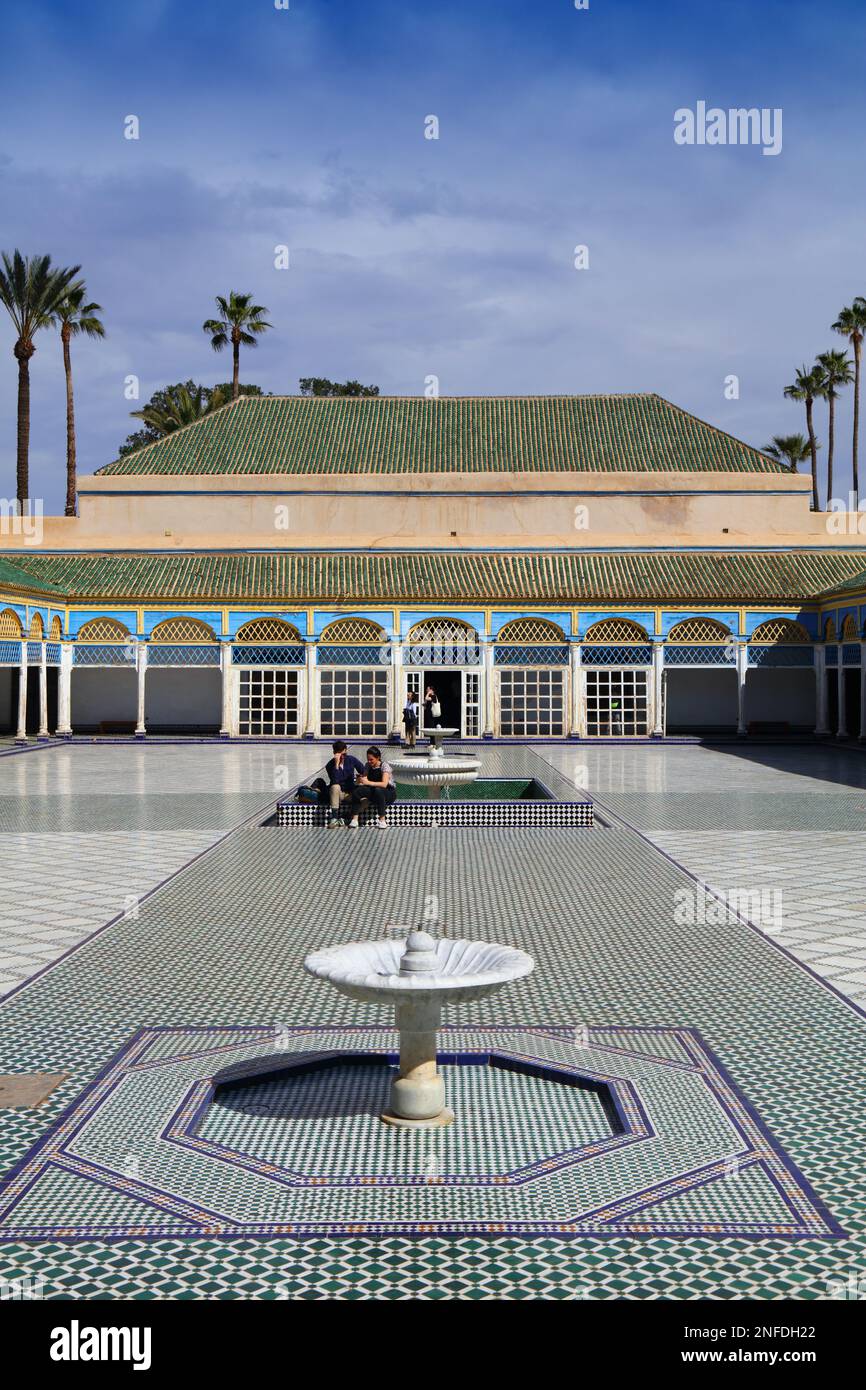 MARRAKECH, MOROCCO - FEBRUARY 20, 2022: Tourists visit Bahia Palace ...