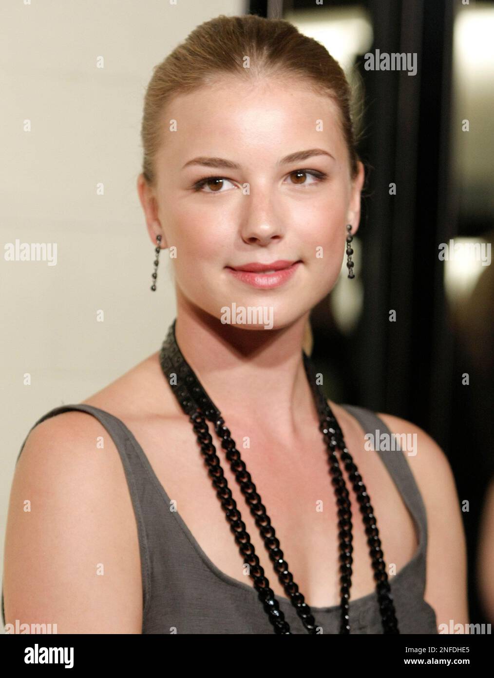 Actress Emily VanCamp poses on the press line at the reopening ...