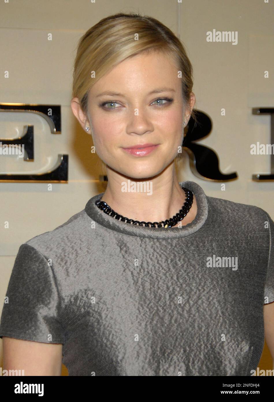 Actress Amy Smart poses on the press line at the reopening celebration ...