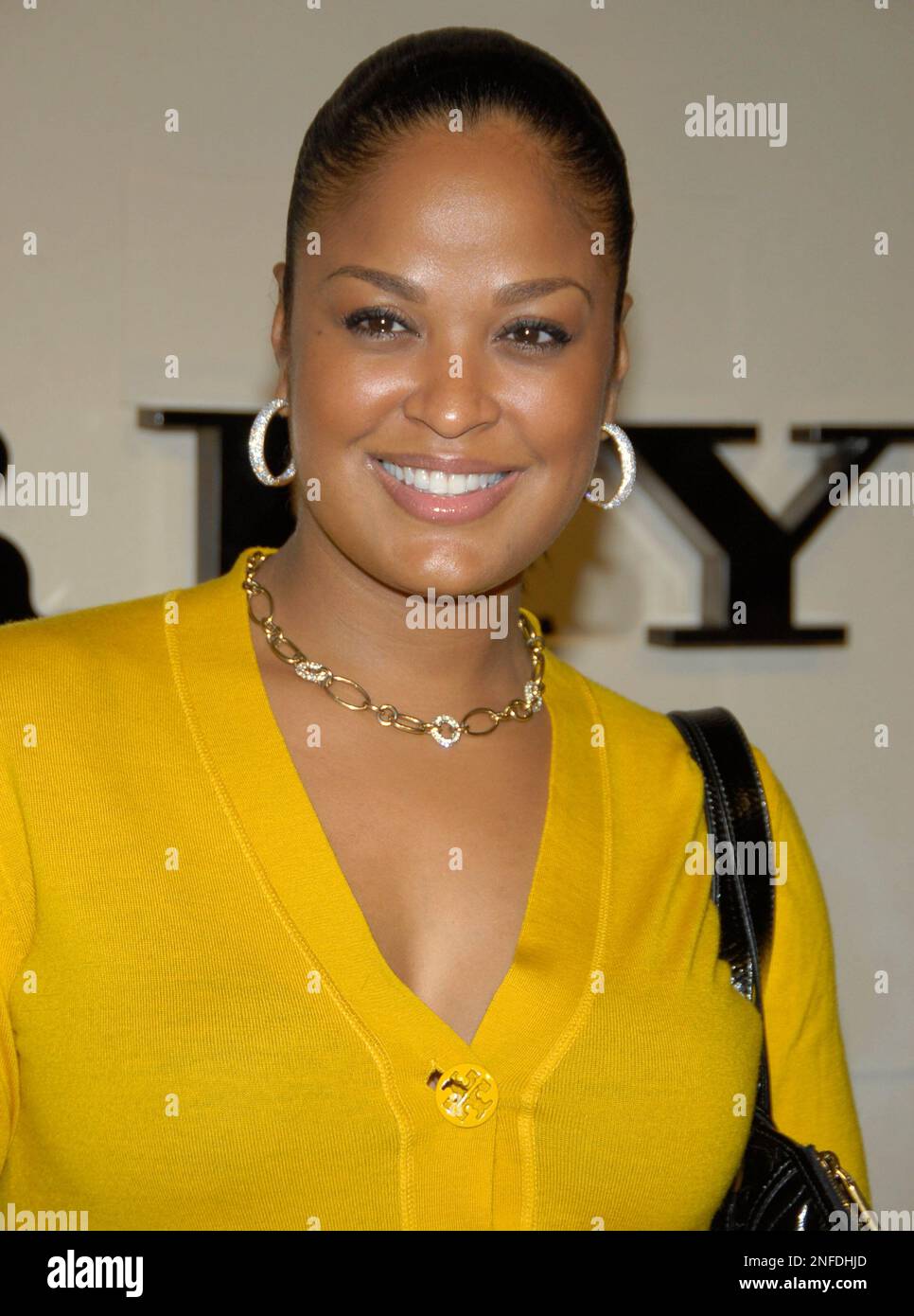 Boxer Laila Ali poses on the press line at the reopening celebration of ...
