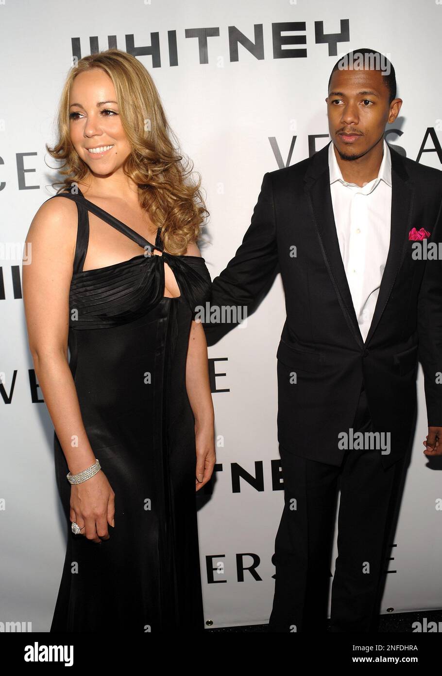 Singer Mariah Carey and husband actor Nick Cannon attend the Whitney ...