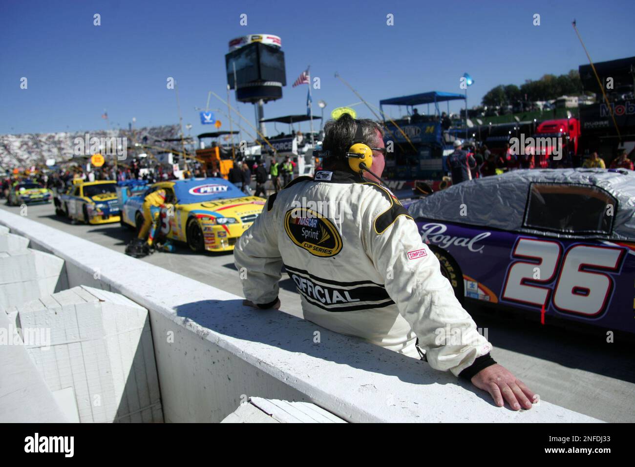 NASCAR official stands on pit lane before the start of NASCAR Sprint ...
