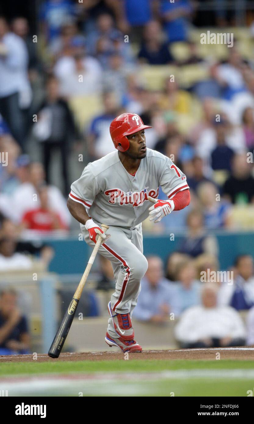 Philadelphia Phillies Jimmy Rollins in action hitting a home run ...