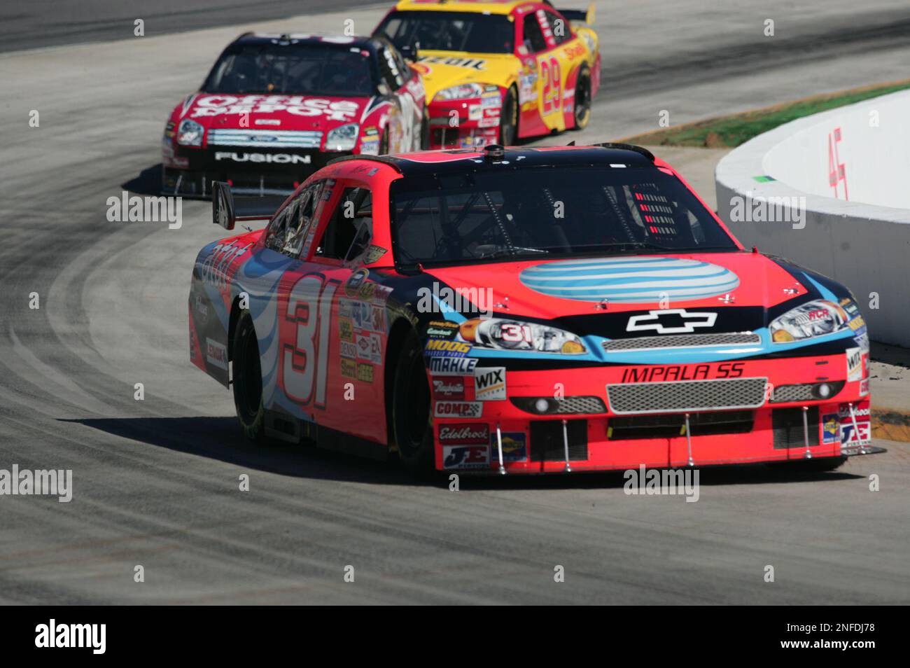 Jeff Burton, driver of the AT&T Mobility Chevrolet, leads a group of ...