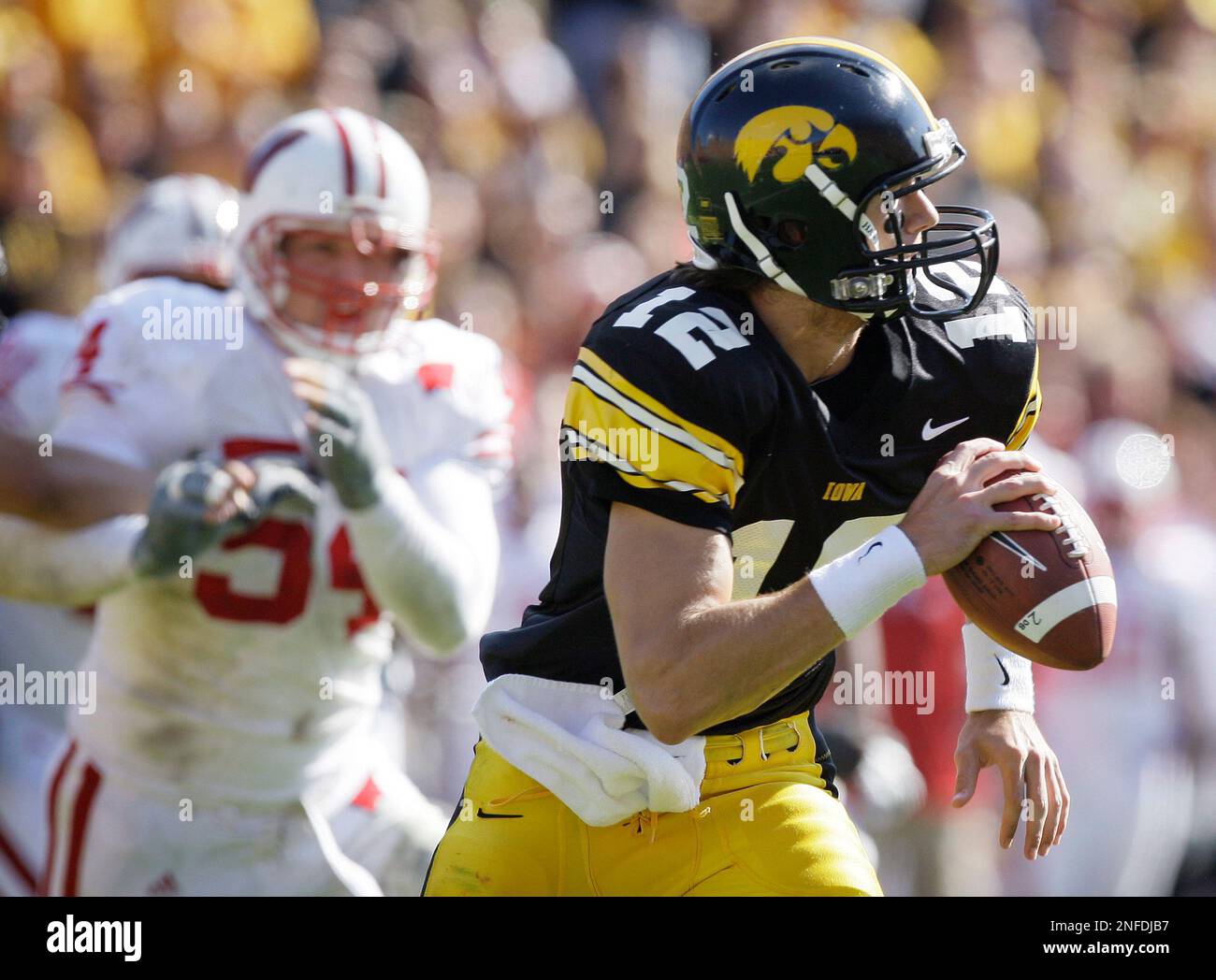 Iowa quarterback Ricky Stanzi looks to throw a pass during the second ...