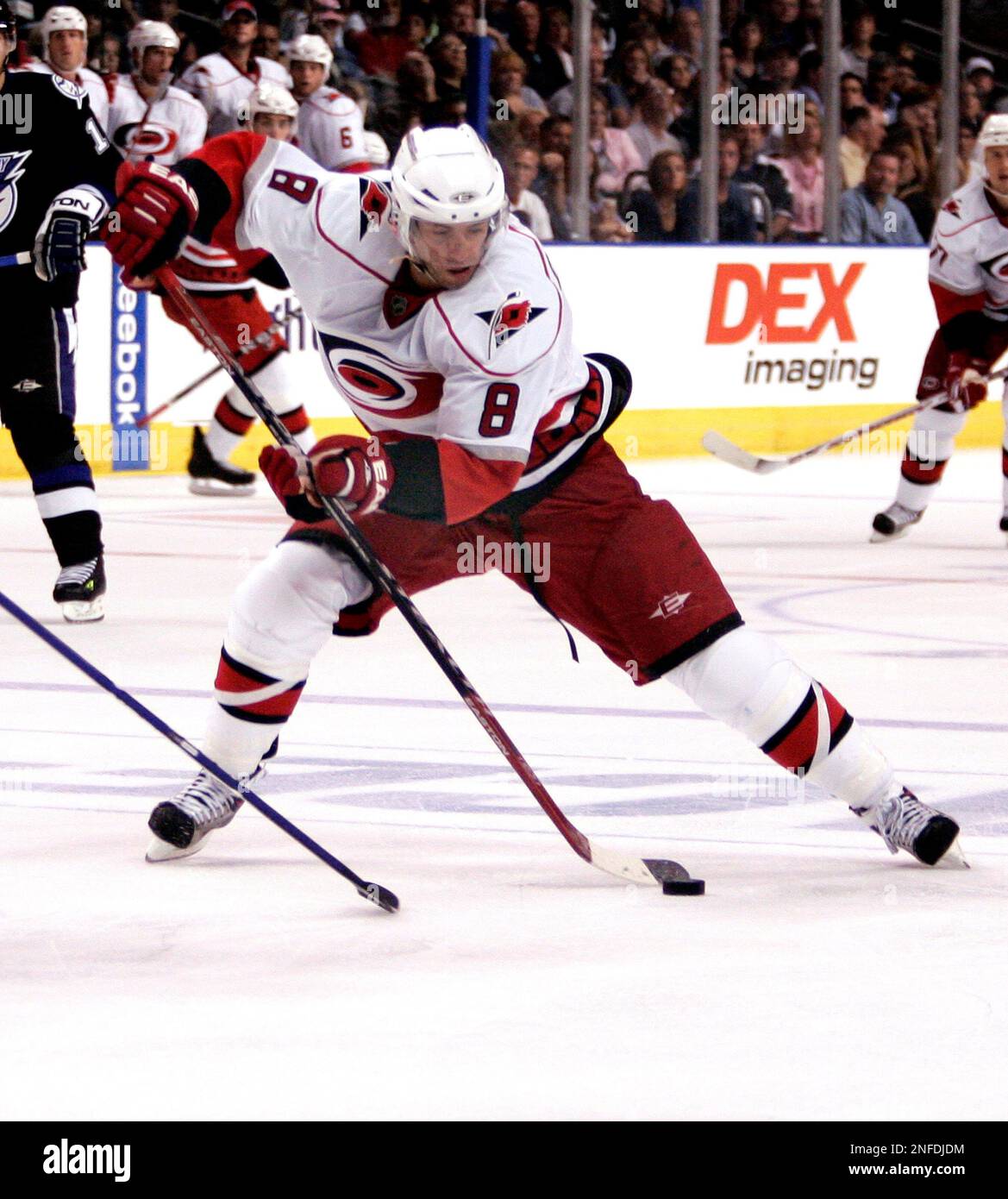 Carolina Hurricanes forward Matt Cullen controls the puck in an NHL ...