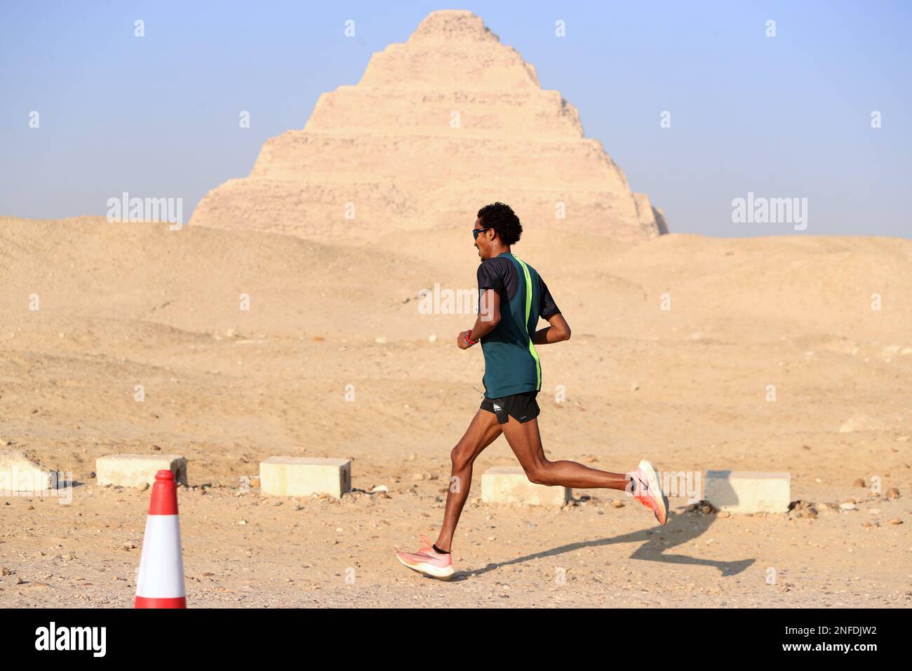 Saqqara, Egypt. 17th Feb, 2023. A runner participates in the Saqqara ...