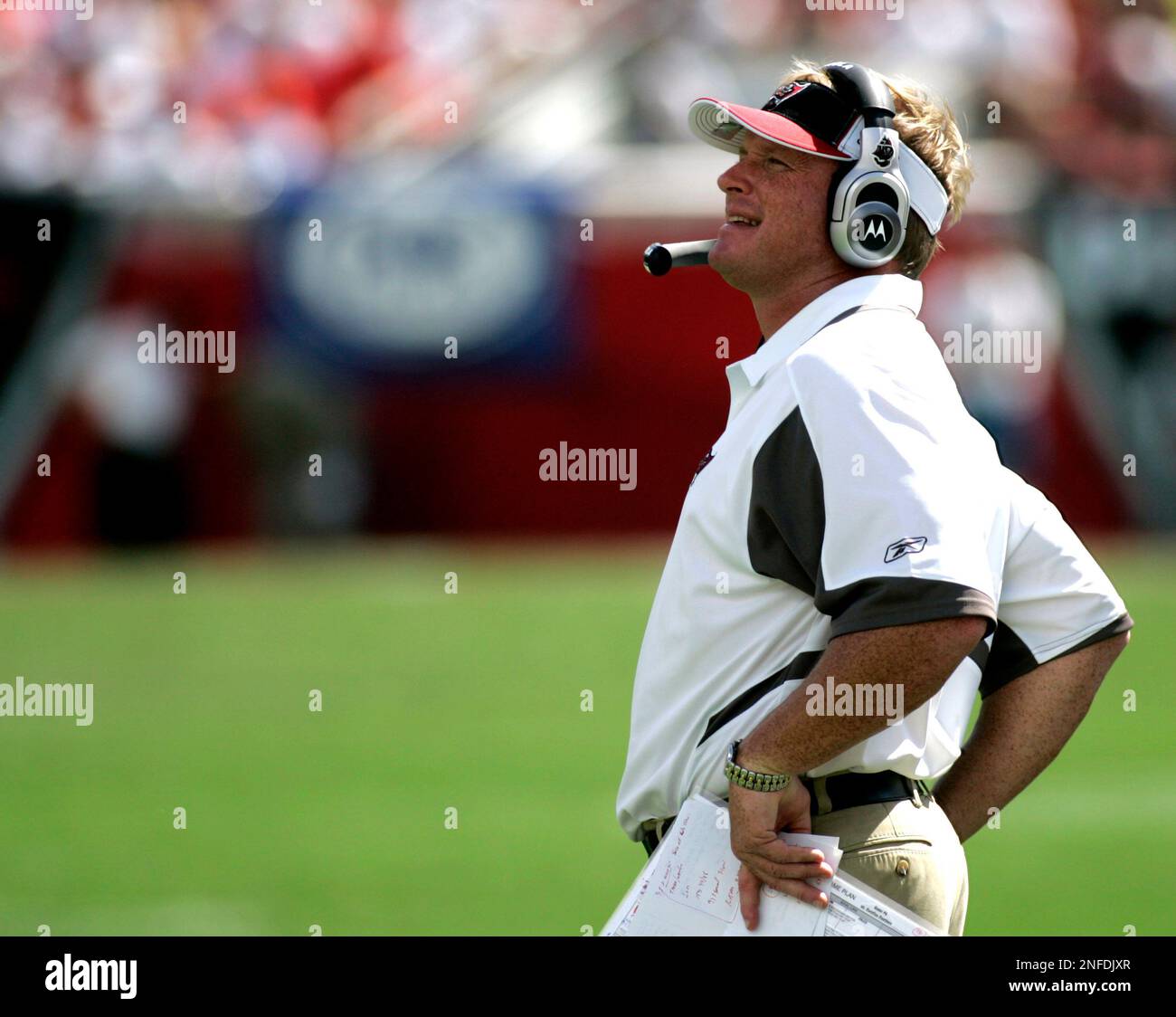 Tampa Bay Buccaneers head coach Jon Gruden watches the replay during an ...