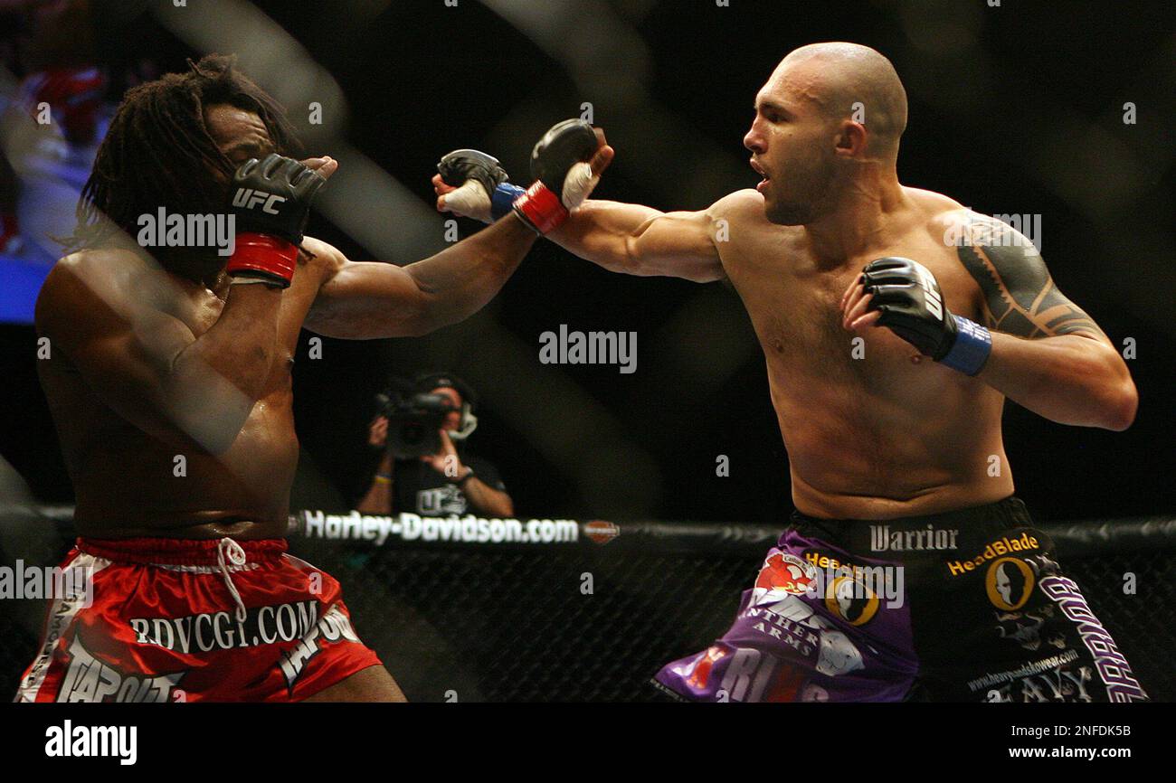 Luis Arthur Cane, right, in action against Rameau Thierry Sokoudjou ...